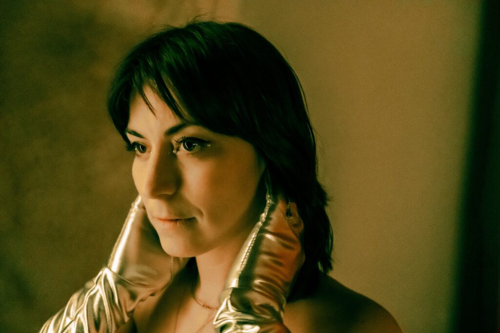 Video Premiere: Emily Afton's "Running Out of Time" and the Brutality ...